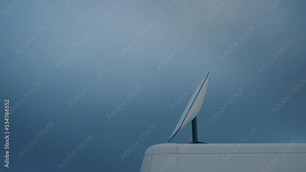Close-up shot of Starlink SpaceX satellite internet receiver on a roof ...