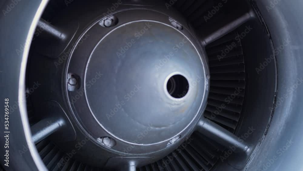 Close-up of an engine turbine combustion chamber of a jet engine with ...