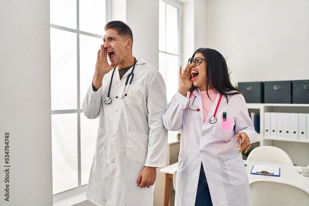 Young doctors wearing uniform and stethoscope at the clinic clueless ...