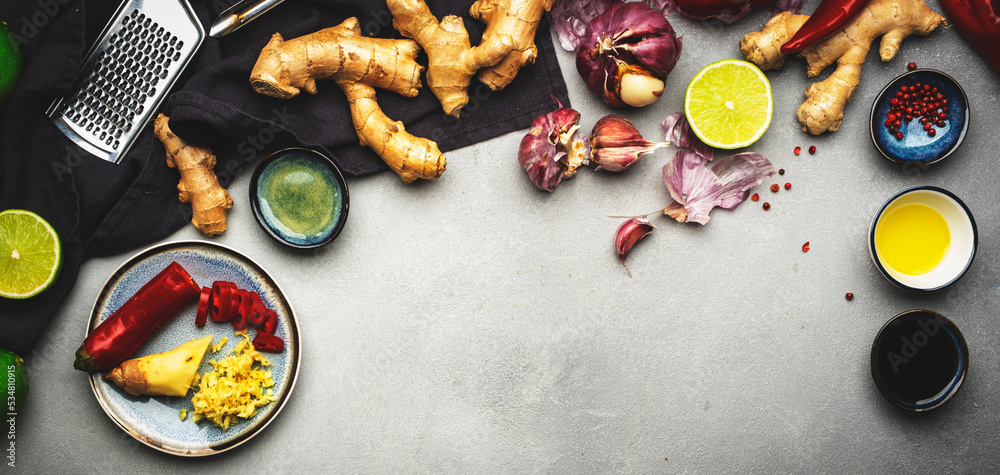 Asian cuisine ingredients, food background. Ginger, lime, chili pepper ...