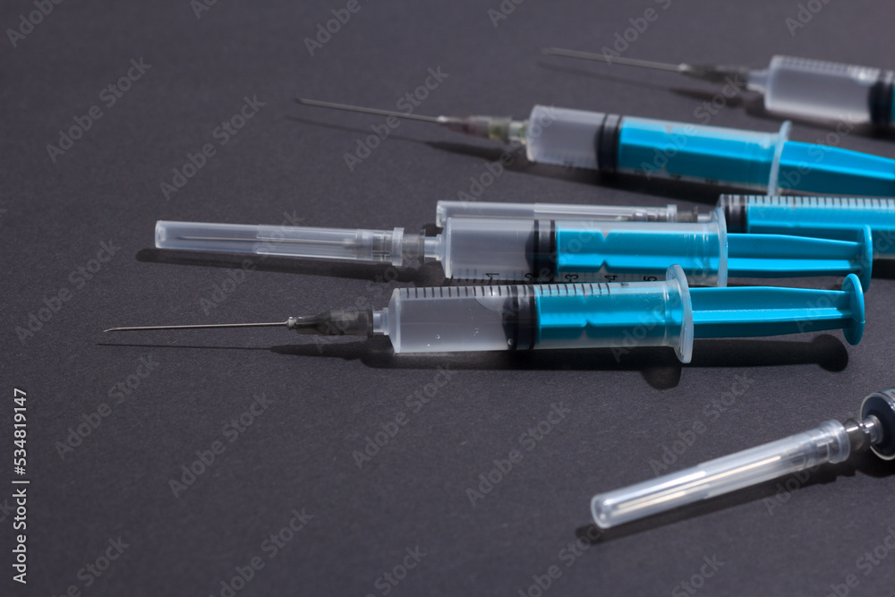 Disposable plastic syringe prepared for injection and vaccination in ...