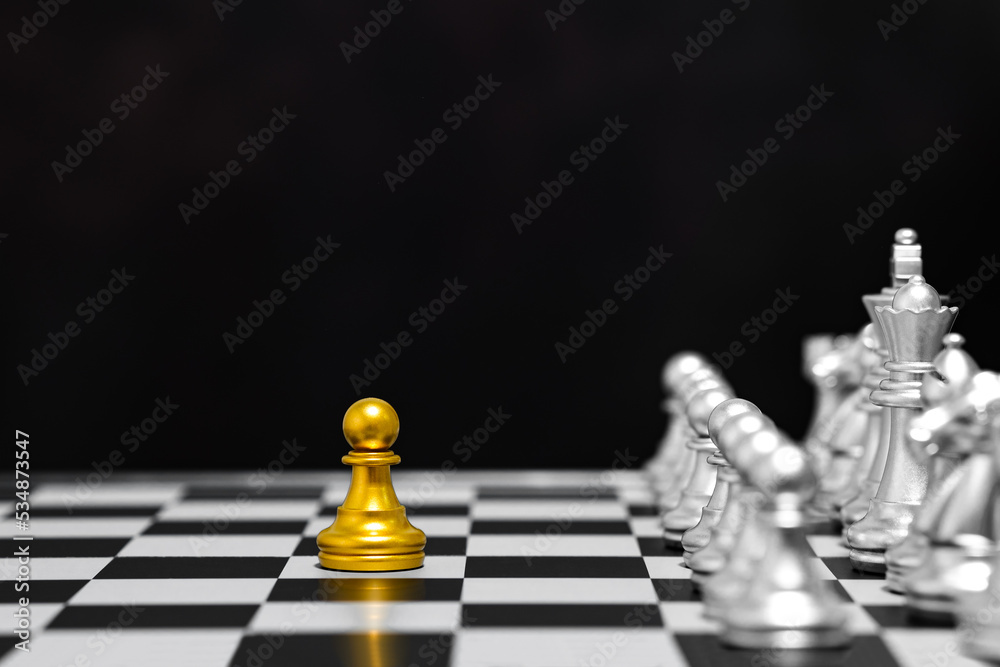 Chess Single pawn stand alone against many enemies as a symbol of ...