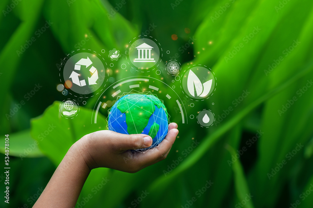 Hand holding green earth ESG icon for Environment Social and Governance ...