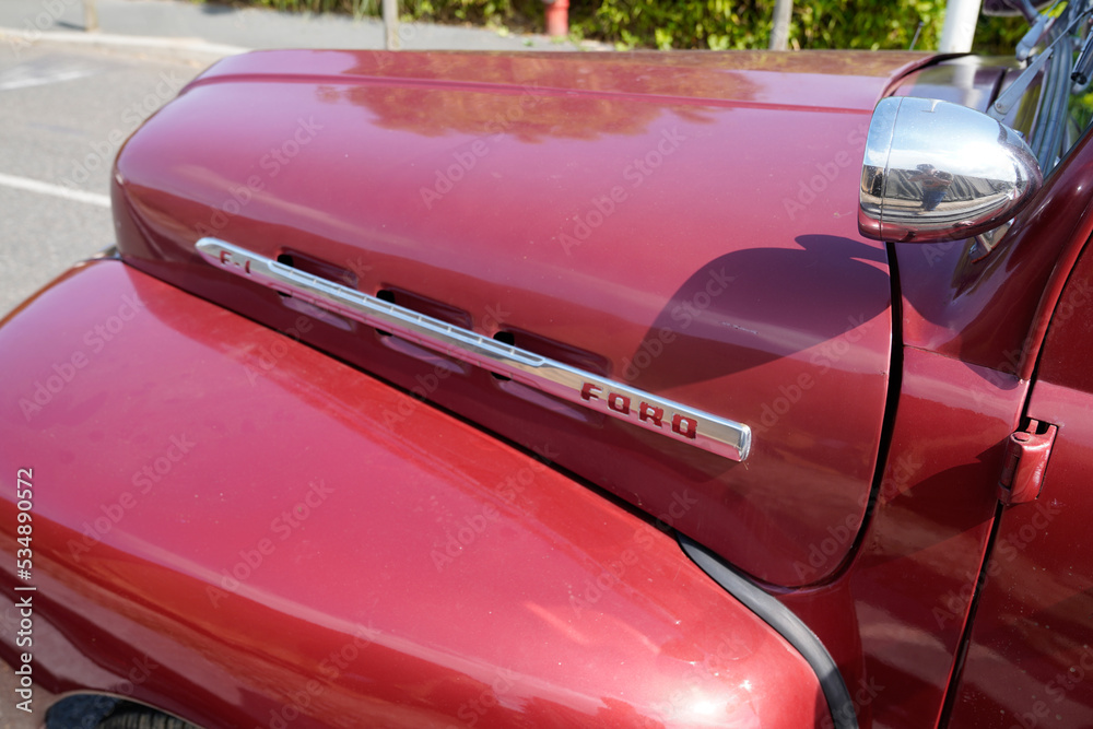 Ford old logo brand and text sign on ancient f-1 pick up truck vintage ...