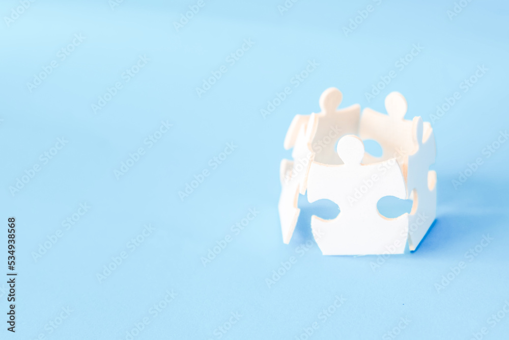 Teamwork collaboration concept, a jigsaw that represents a million team ...