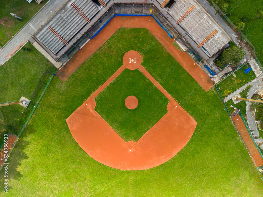 Drone Aerial View flying above a outdoor Baseball Field Diamond. Stock ... Drone Aerial View flying above a outdoor Baseball Field Diamond. Stock ...
