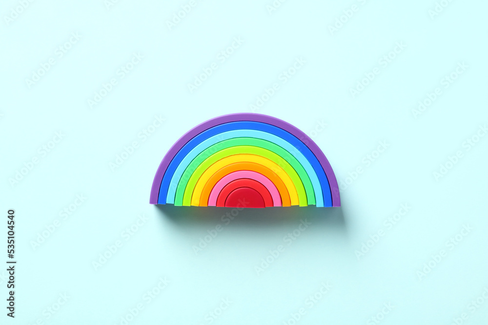 Montessori rainbow series stacking game, learning toy on pastel blue ...