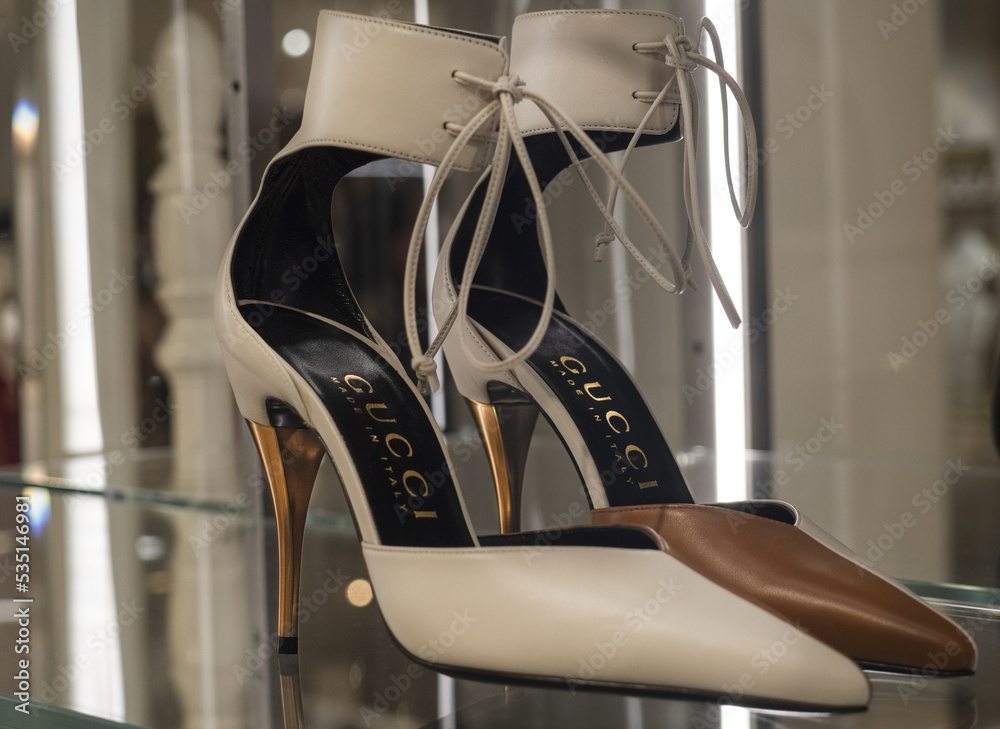 women's décolleté, high stiletto heel and lace-up ankle strap by Gucci ...