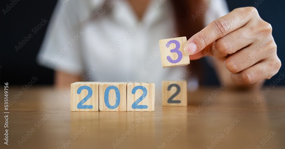 2023 New year concept. From 2022 to 2023 on wooden block. Inspiration ...