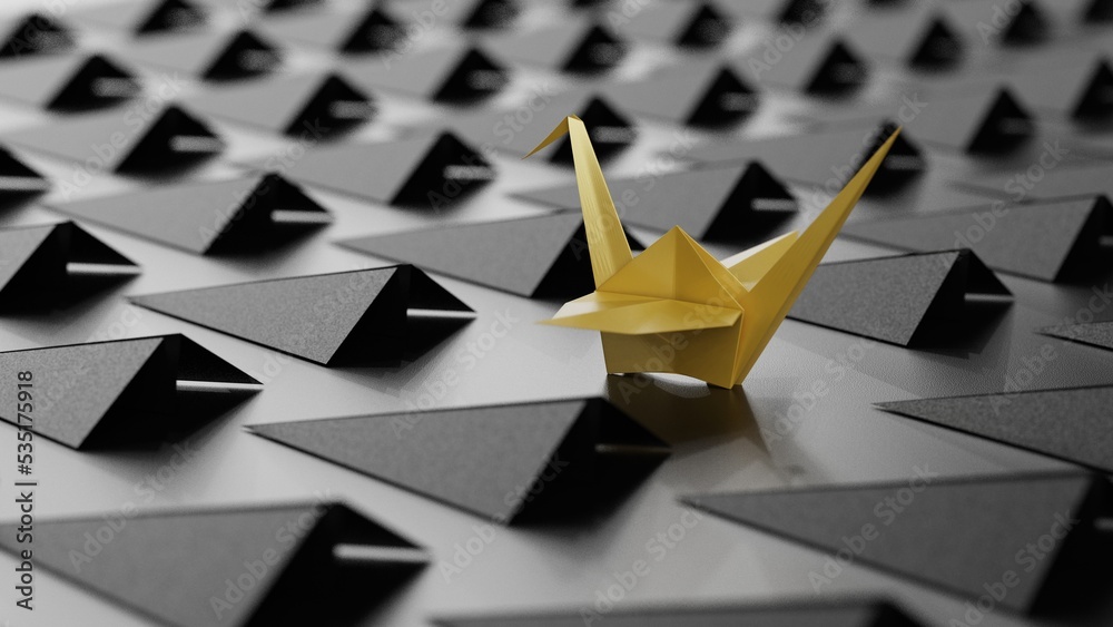 Origami of gold crane and many black airplanes on black board under ...