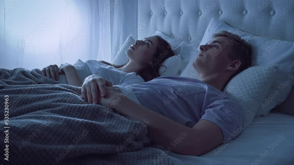 Couple Lying in Bed at Night. Couple Sleeping in Bed. Couple in Bed at ...