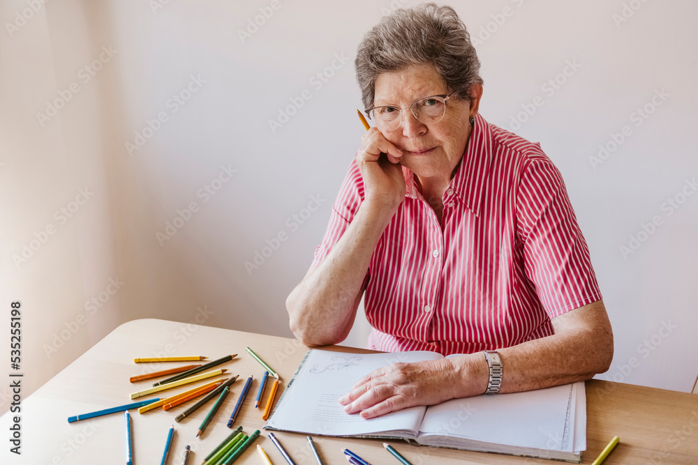 grandmother drawing with colored pencils Stock Photo | Adobe Stock