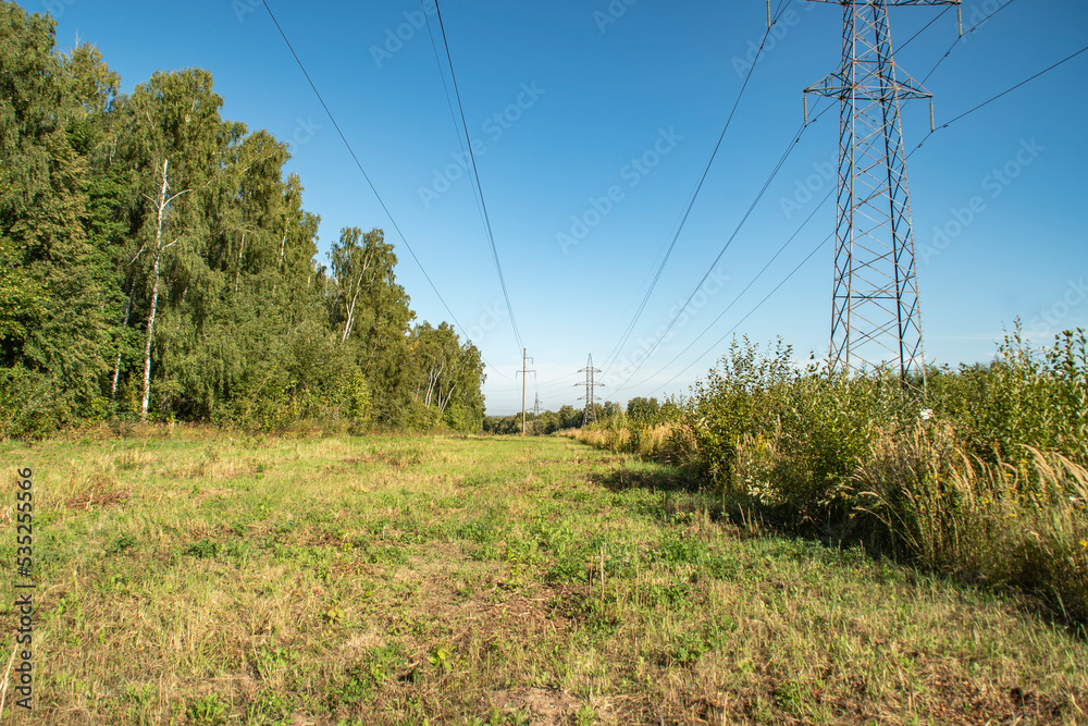 Power line towers. Out-of-town power supply system. Energy ...