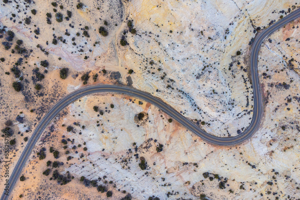 Drone view of asphalt road going through sandy valley in Utah Stock ...