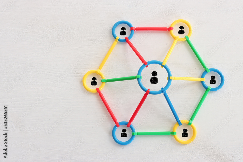 Concept image of unity and teamwork. People icons tied together as a ...