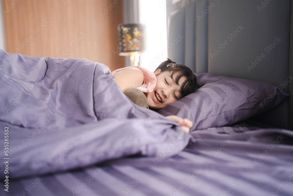 asian children girl person are sleep on bed at home, little young cute ...