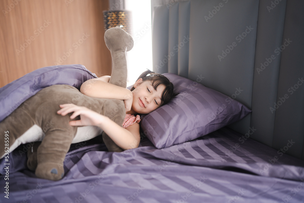 asian children girl person are sleep on bed at home, little young cute ...