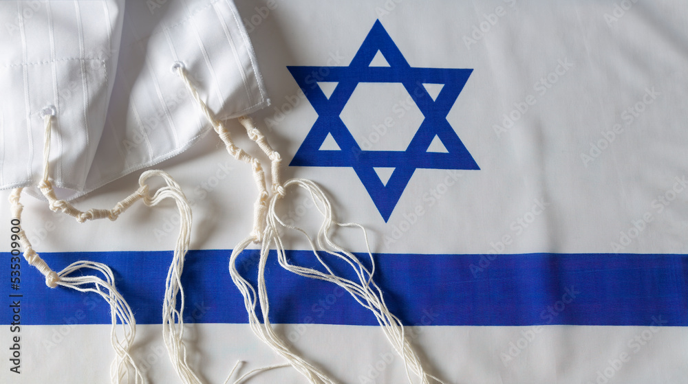 The tallit katan (Hebrew tallis koton, small tallit) with the flag of ...
