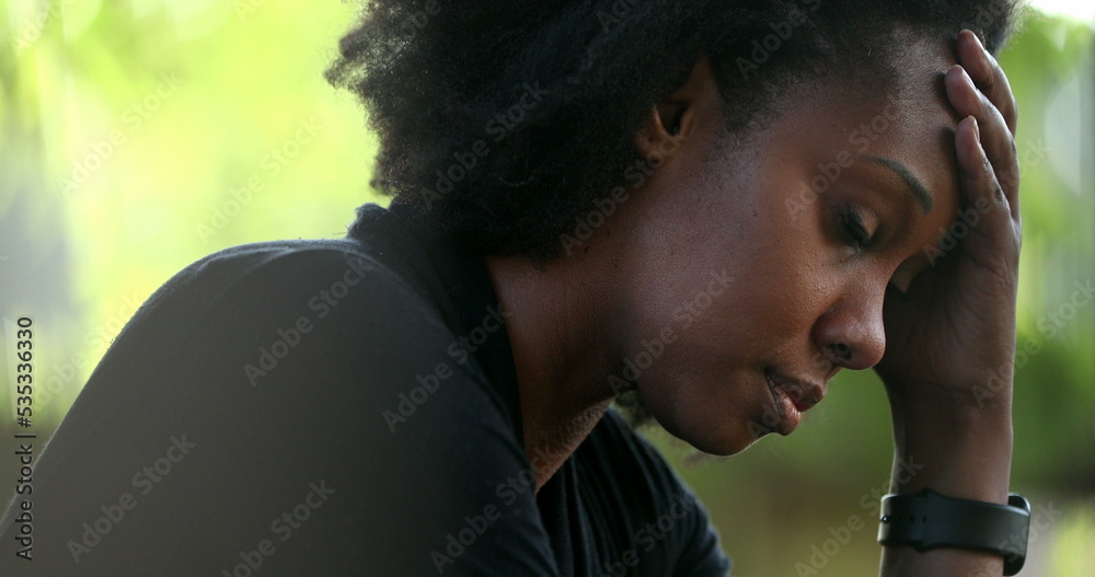 Preoccupied black woman feeling stress and pressure. African person ...