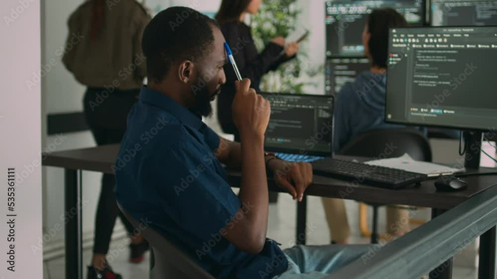 African American System Engineer Thinking About Html Script Development To Code It Language In