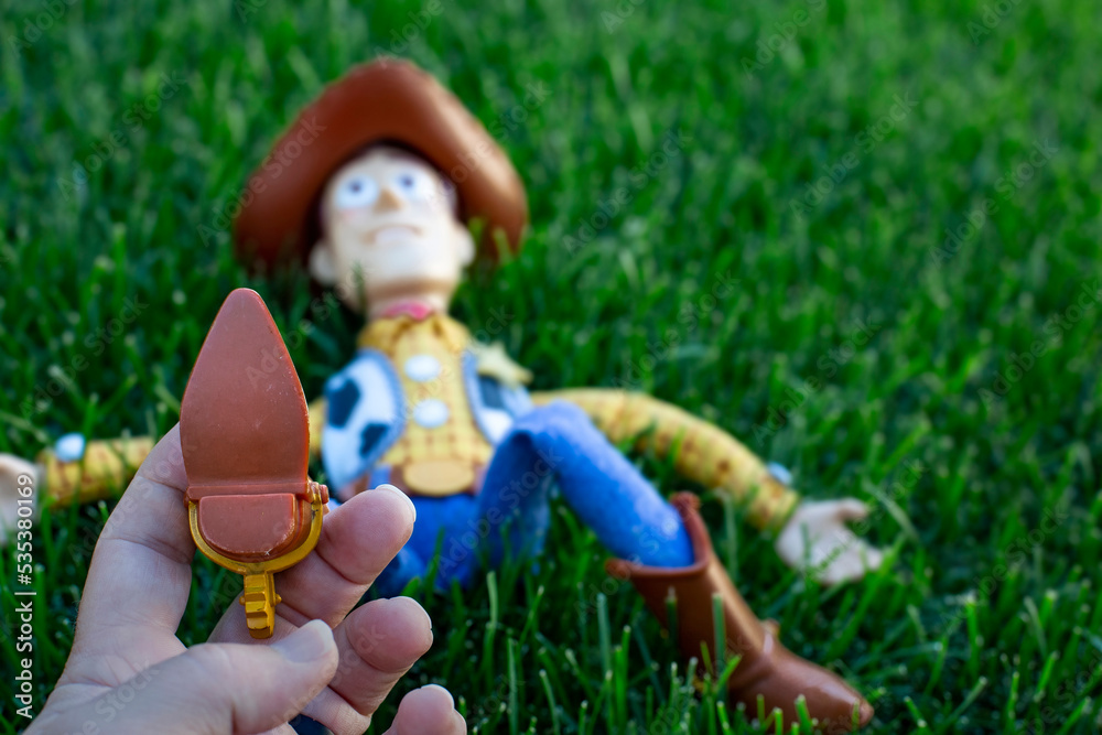 Looking at the underneath of the boot of a Woody from Toy Story ...