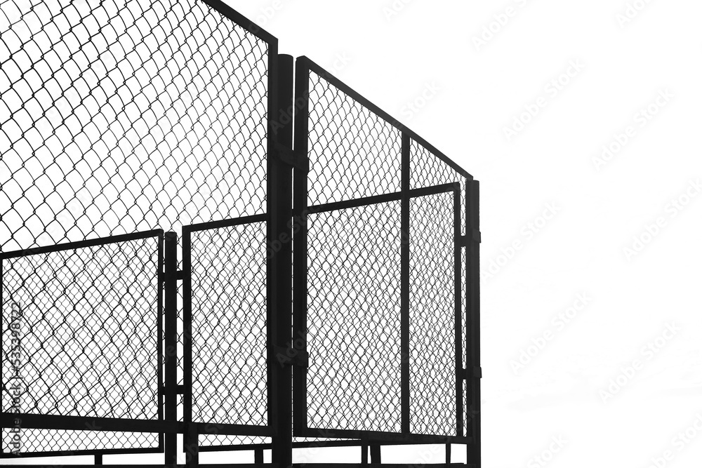 Basketball and Futsal court behind fence mesh netting. Outdoor stadium ...