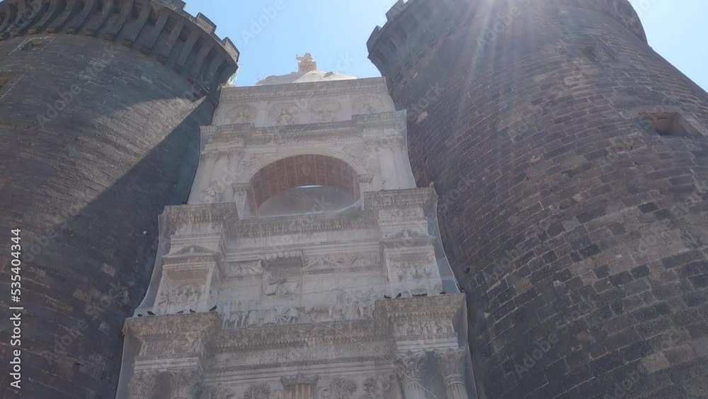 Main entrance Castel Nuovo in Naples, Italy, triumphal arch between two ...