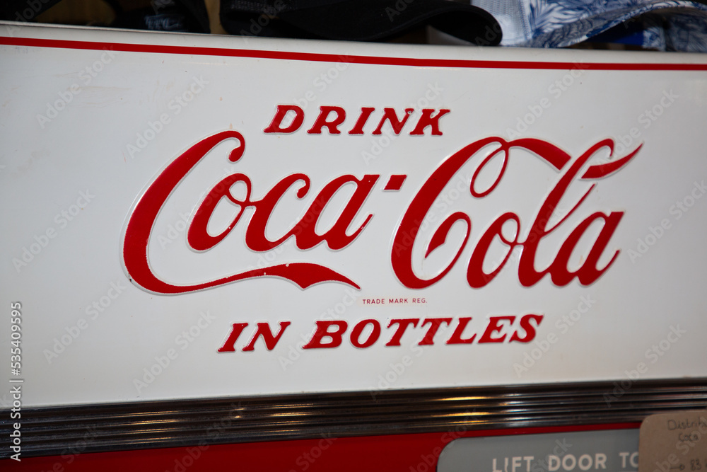 Coca Cola drink in bottles sign brand and text logo on fridge famous ...