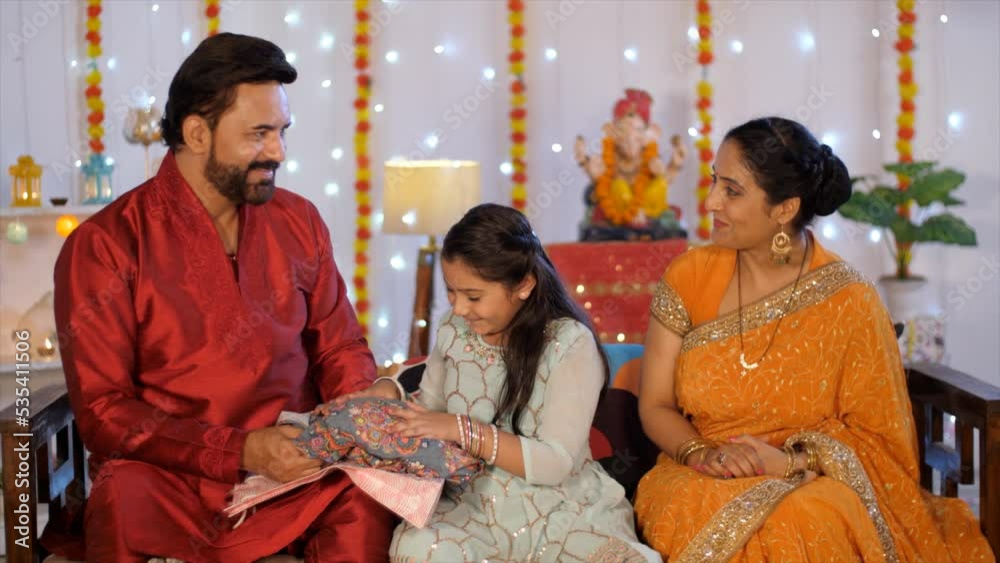 Small North Indian family in the living room - family bonding happy ...