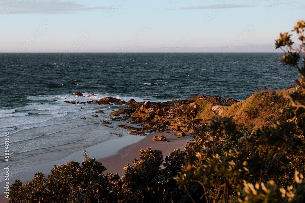 Rocky shore of Little Wategos Beach in Byron Bay, Australia Stock Photo ...