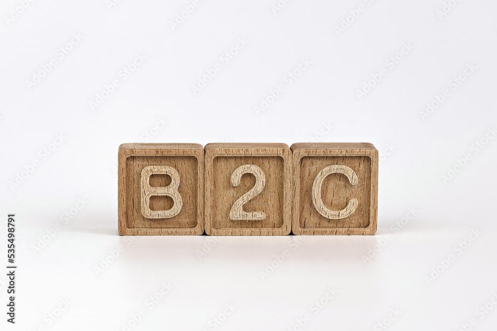 B2C business-to-consumer business relationship theme. wooden cubes with ...