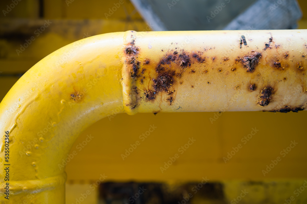 Close-up of corroded steel pipe, corrosion of steel, general corrosion ...
