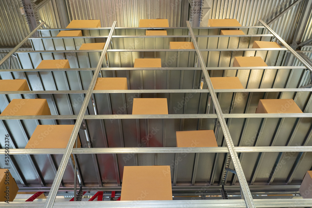 Multi-tier warehouse rack. Steel shelves for long term storage. Steel ...