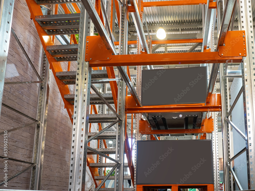 Warehouse automated. Steel racks with rails for moving flights ...