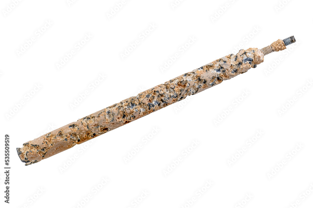Old anode of a water heater. Worn magnesium anode. Rod to protect the ...