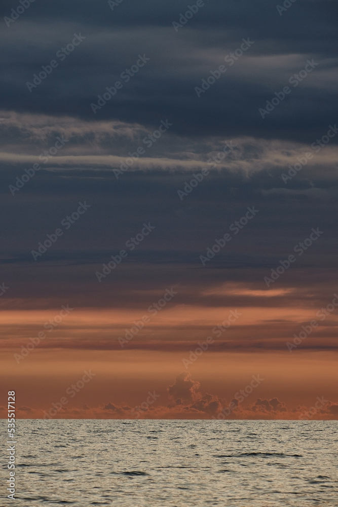 The colourful sunset sky with clouds, like a watercolour painting ...
