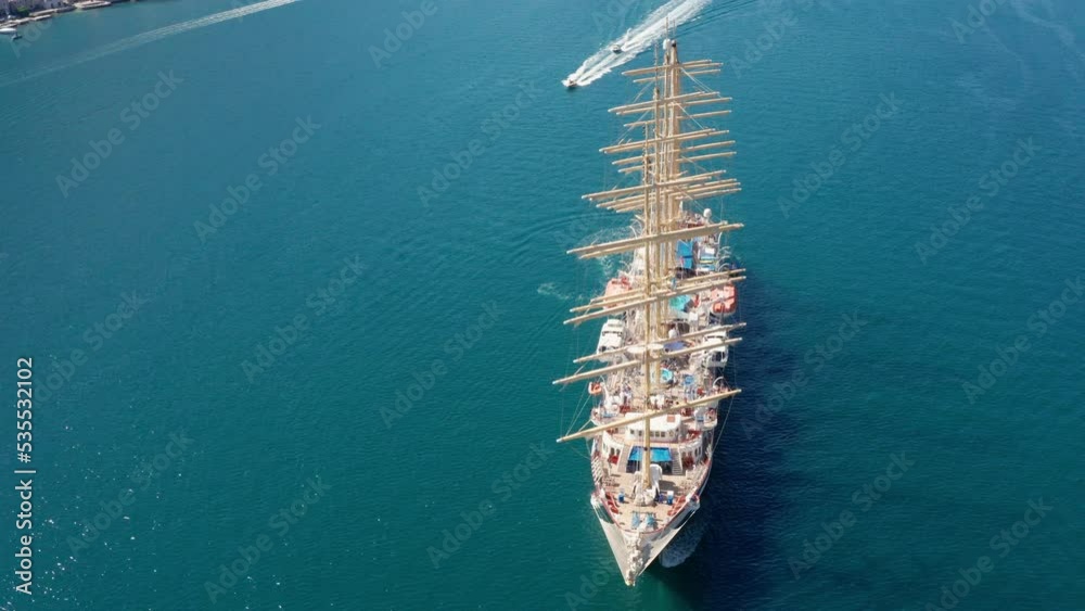 Sailing ship on the sea - old full-rigged clipper boat with five masts ...