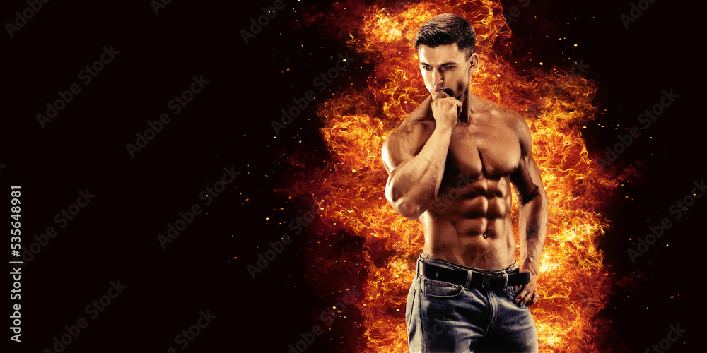 Bodybuilder posing on the fire flames background Stock Photo | Adobe Stock