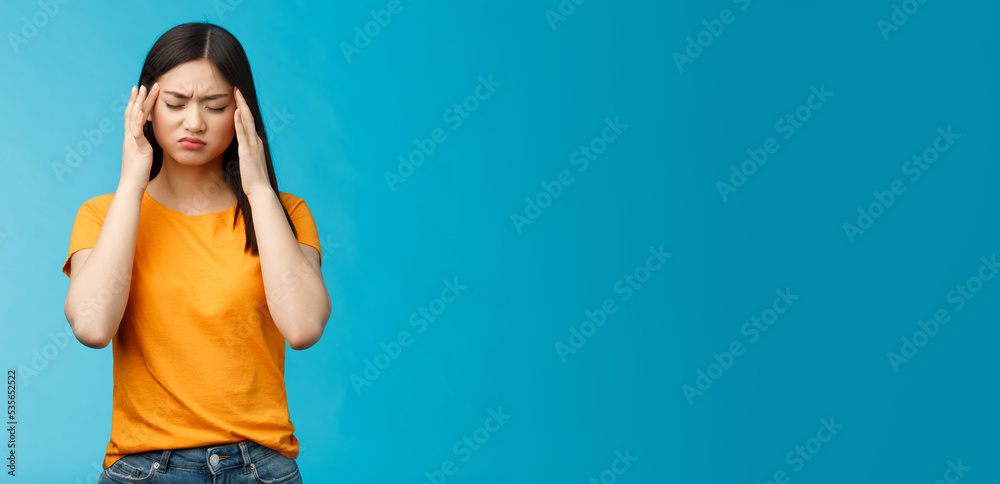 Distressed tired asian woman dark haircut cringe touch temples, suffer ...