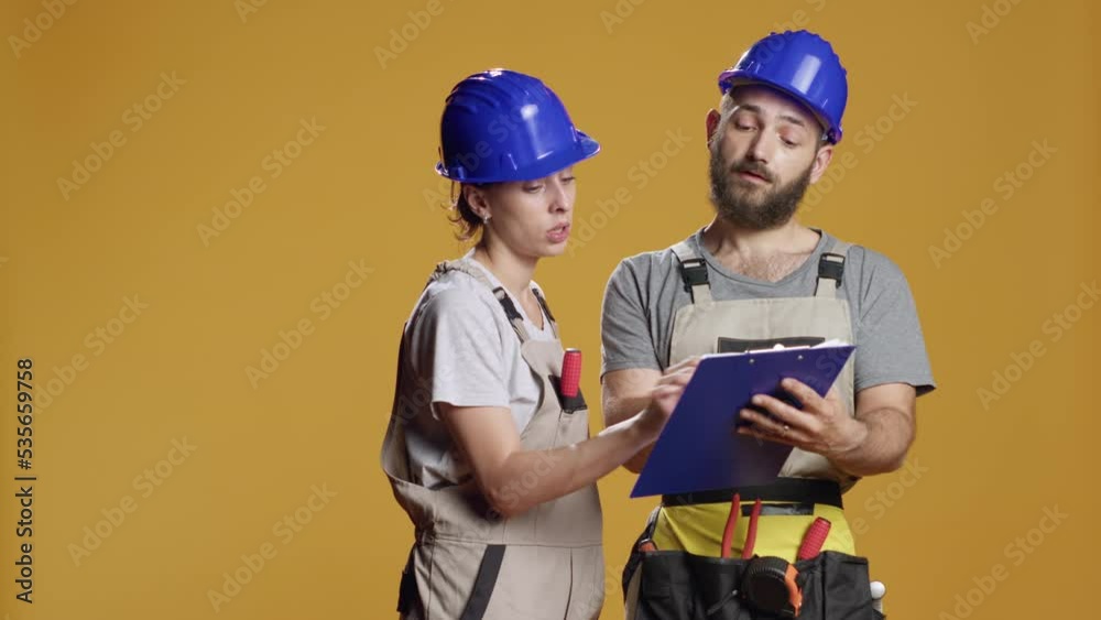 Team of construction workers planning redevelopment and brainstorming ...