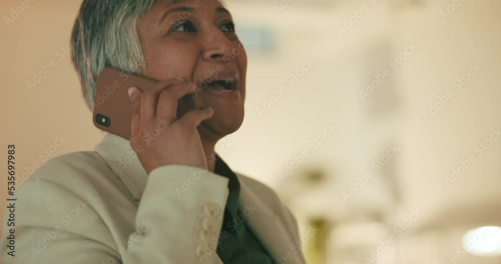 Old woman, phone call and communication in office at night, talk or ...