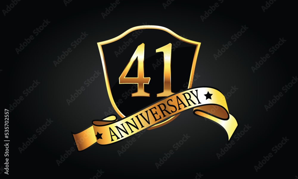 41 year anniversary logo with golden shield and ribbon. Dark elegant ...