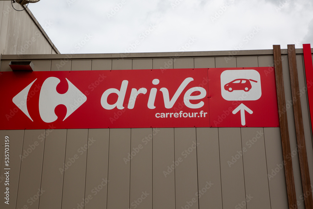 Carrefour drive supermarket sign text shop and brand logo market french ...
