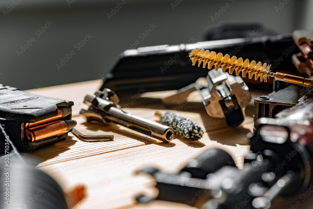 Gunsmith's working table for gun cleaning and maintaining Stock Photo ...