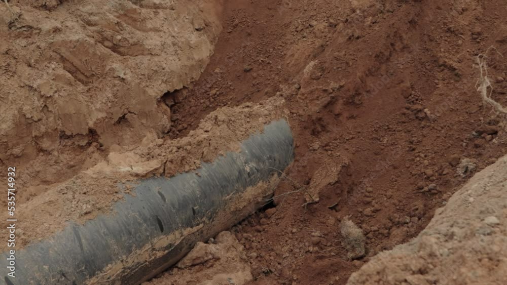 Excavated trench during the laying of a gas underground pipeline. Gas ...