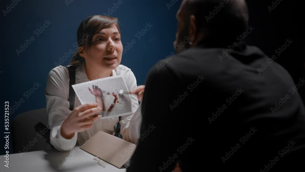 Interrogation, suspect in handcuffs screams and emotionally denies FBI ...