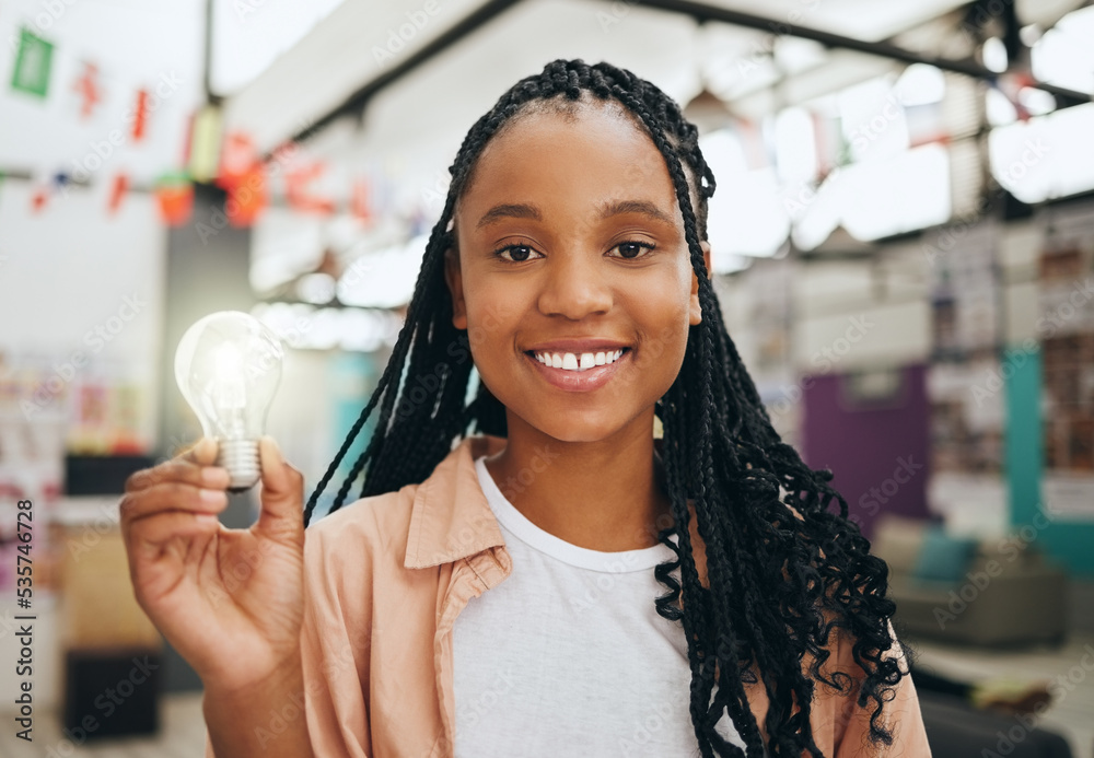 Light bulb, idea and black woman student portrait in classroom for ...
