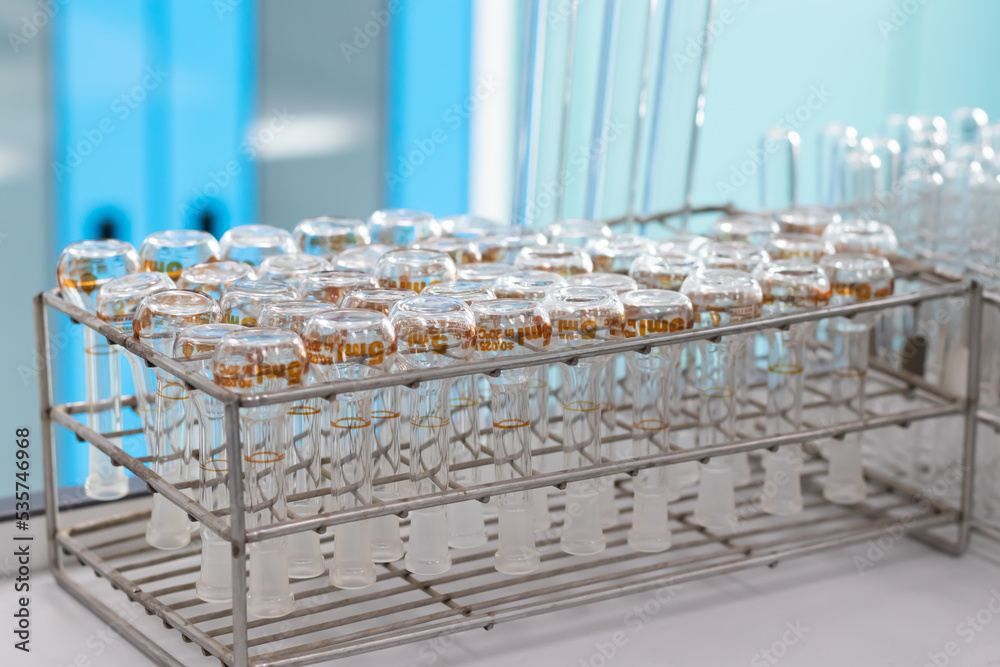 volumetric flask in test tube rack stainless Stock Photo | Adobe Stock