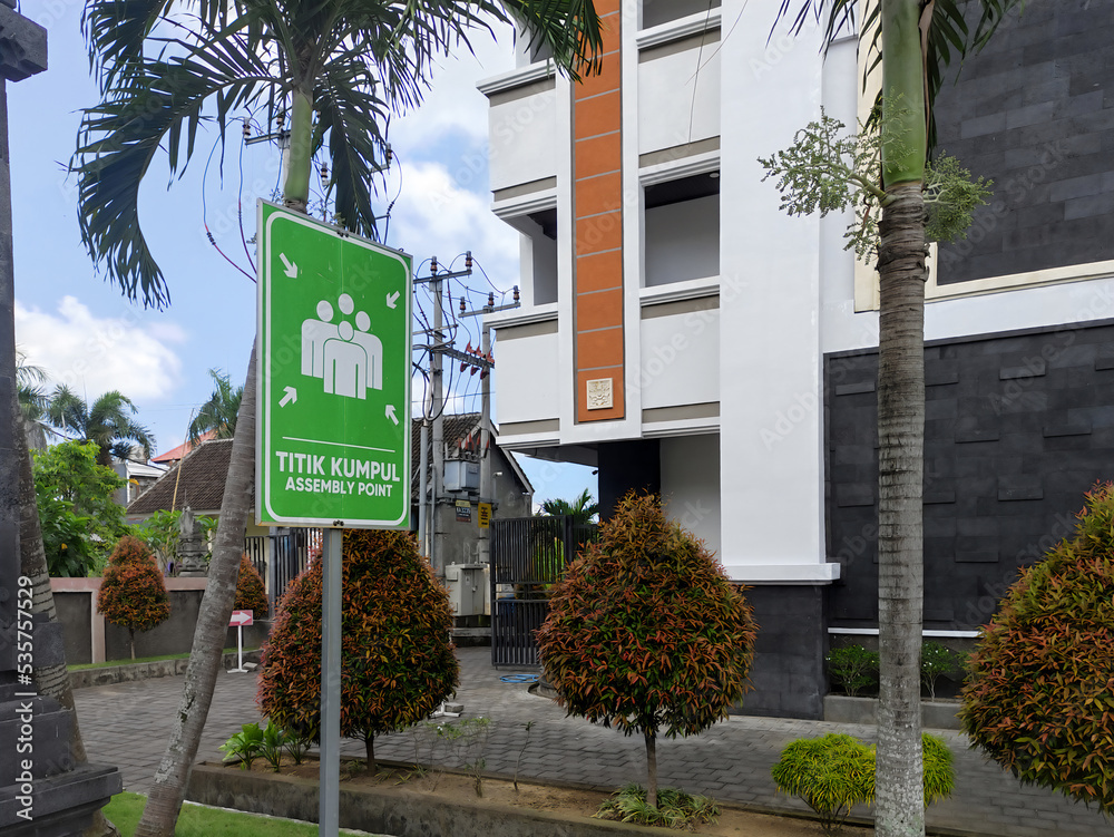 Assembly Point Sign with School Building Background. Stock Photo ...