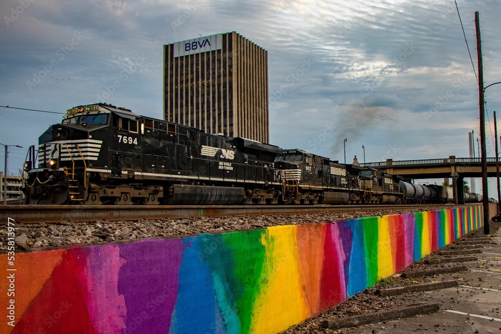 Norfolk Southern train in Birmingham, Alabama, with a colorful wall in ...